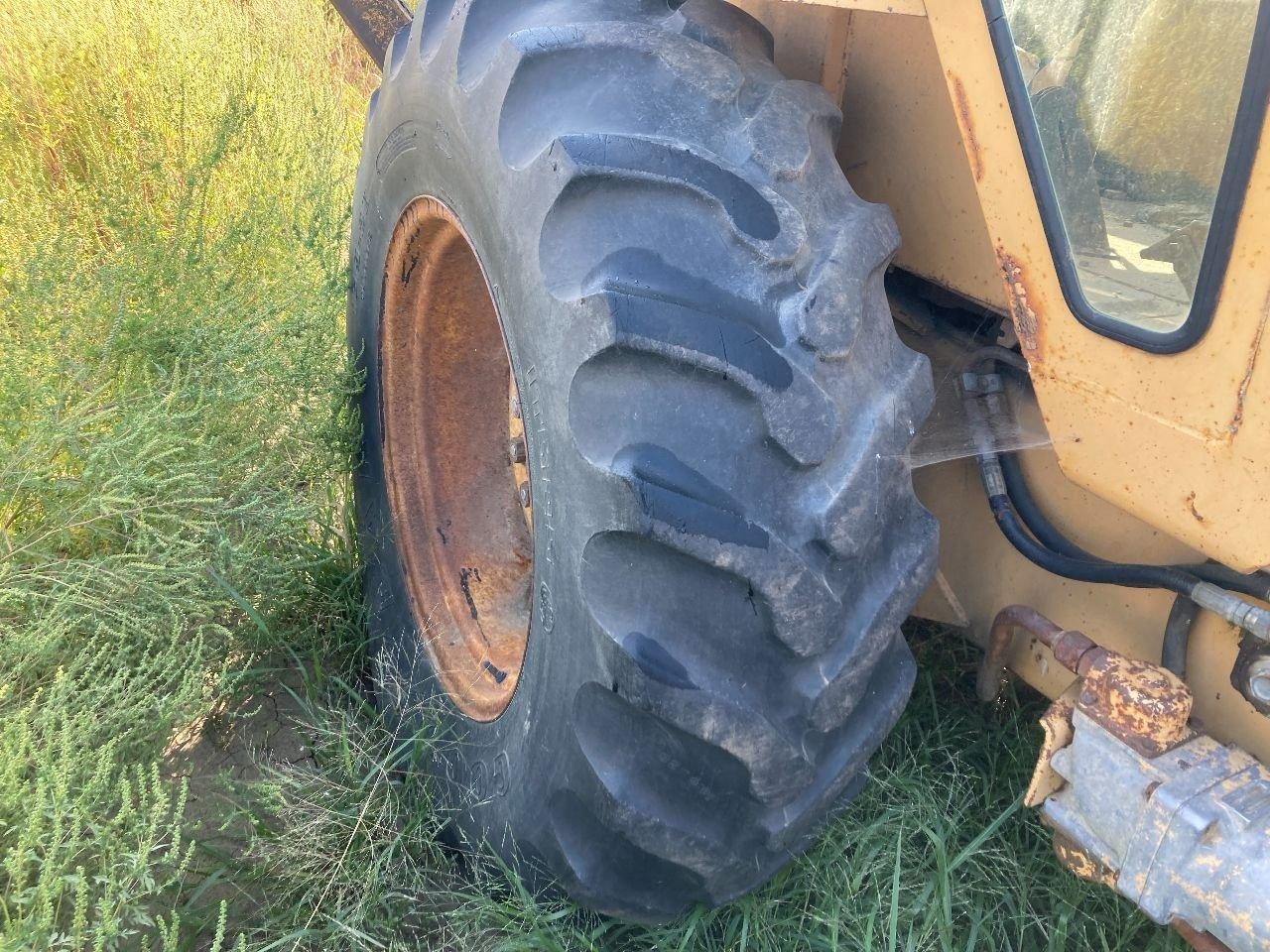 Ford 555 Tire and Rim for Sale