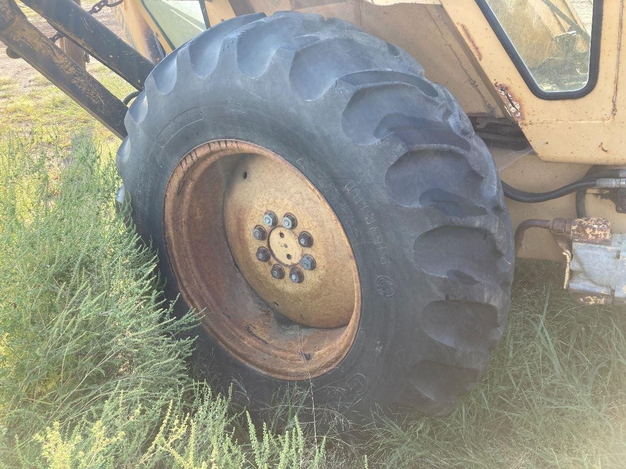 Ford 555 Tire and Rim for Sale