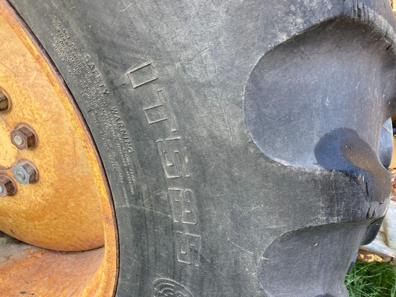 Ford 555 Tire and Rim for Sale