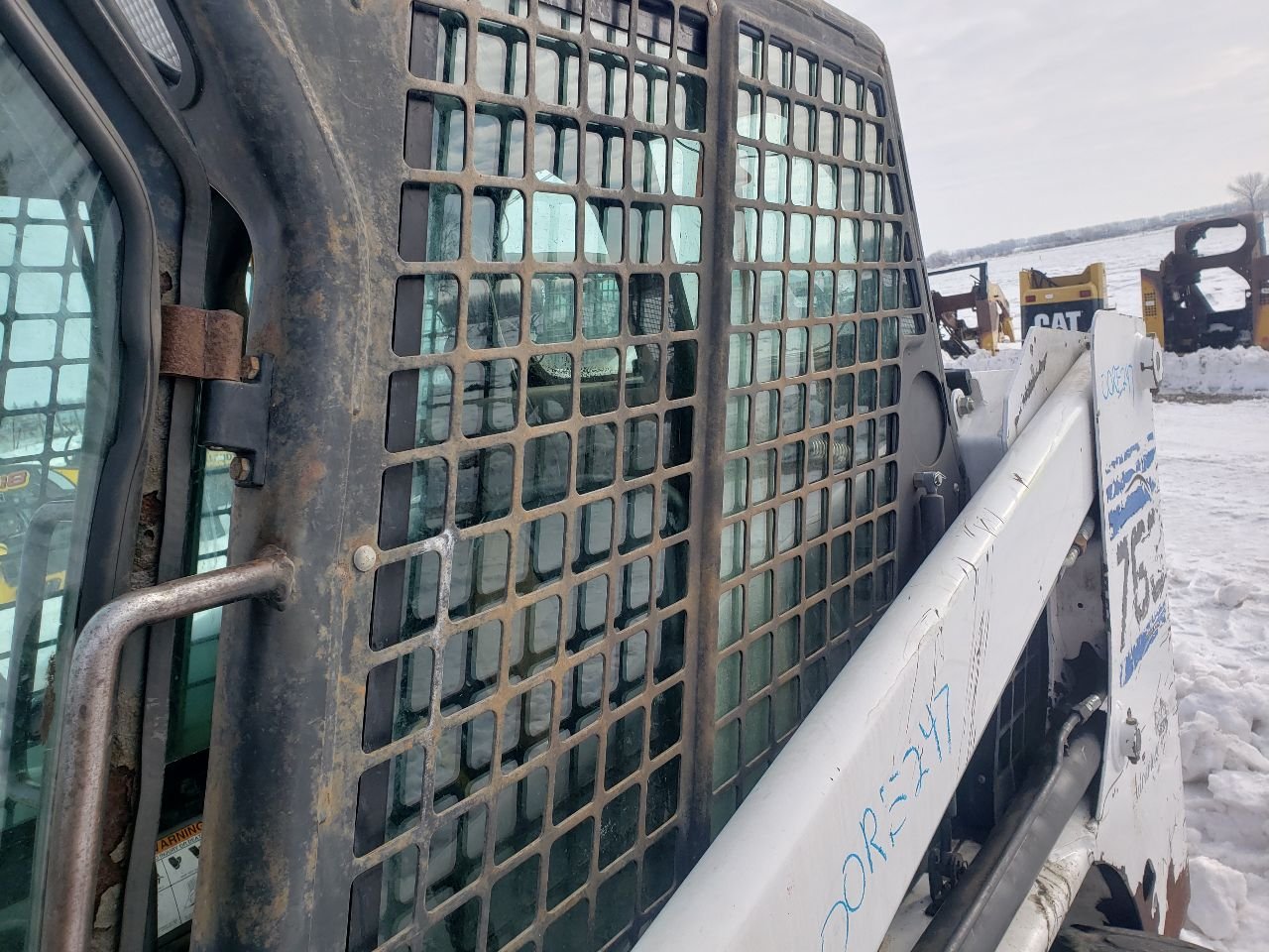7003481 | Bobcat 763 Equip Side Glass for Sale