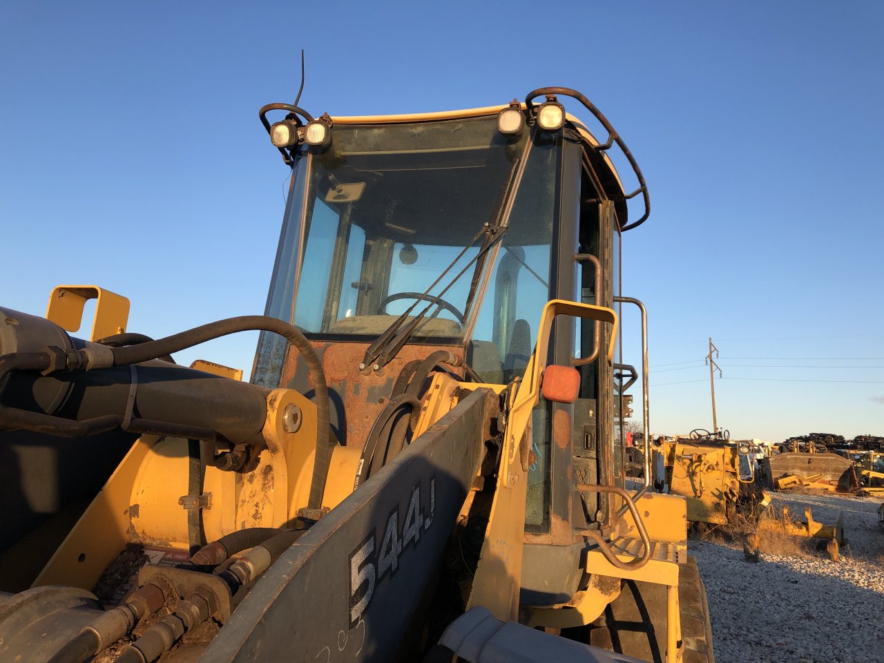 AT332127 | John Deere 544J Cab Assembly for Sale