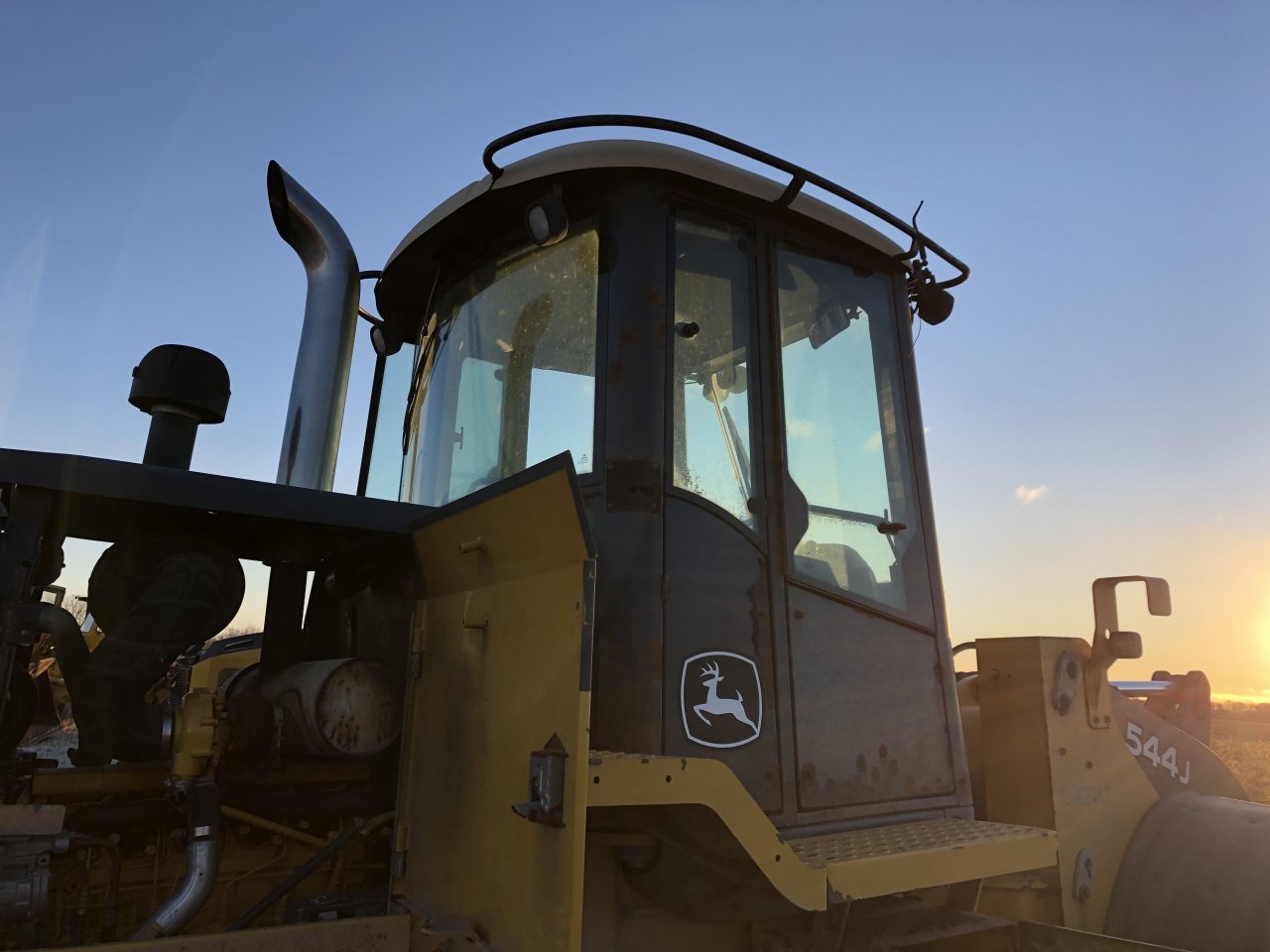 AT332127 | John Deere 544J Cab Assembly for Sale