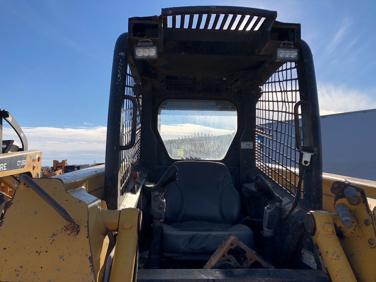 AT378425 | John Deere CT322 Cab Assembly for Sale