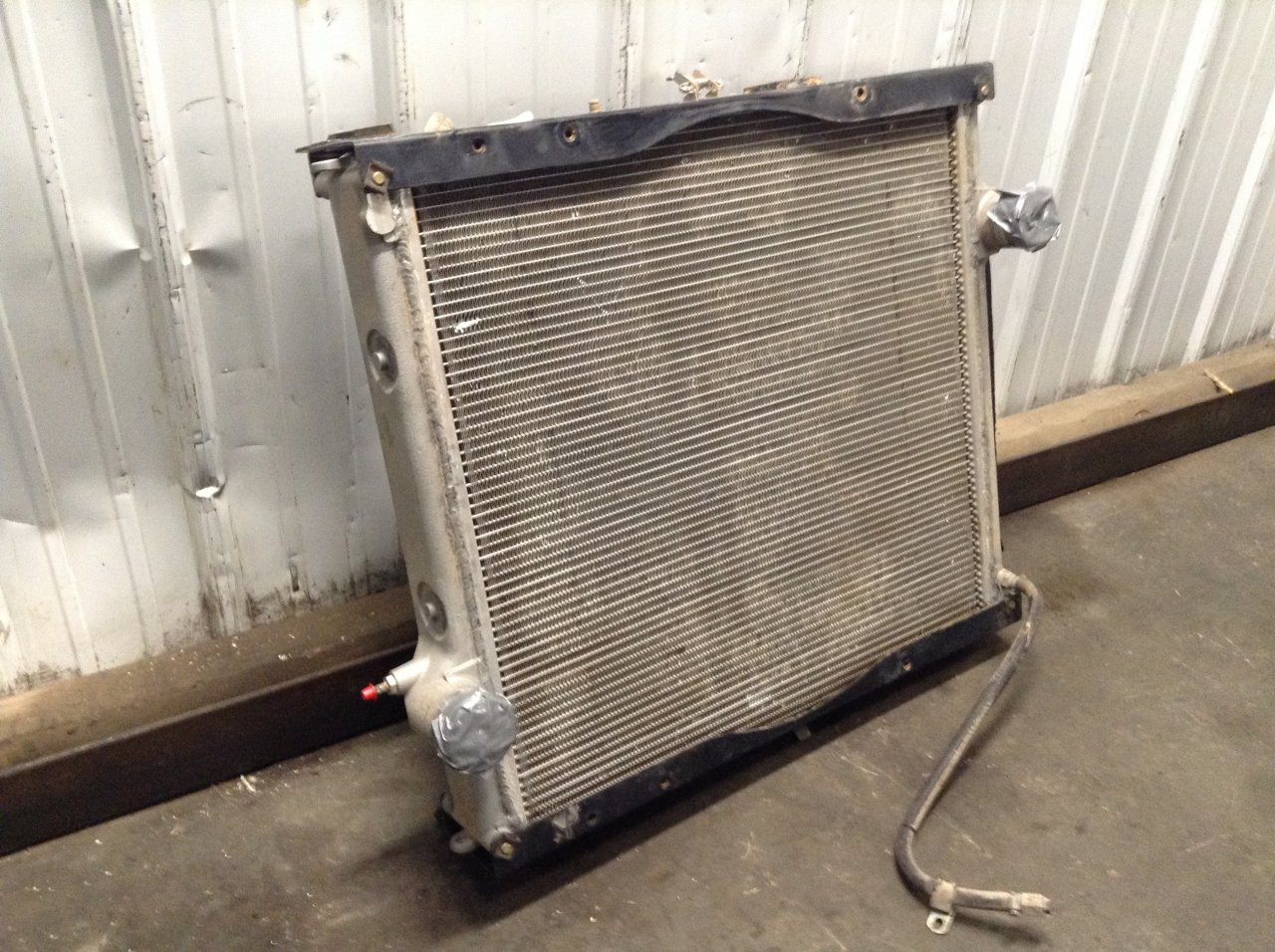 AT369969 | John Deere 310SK Radiator for Sale