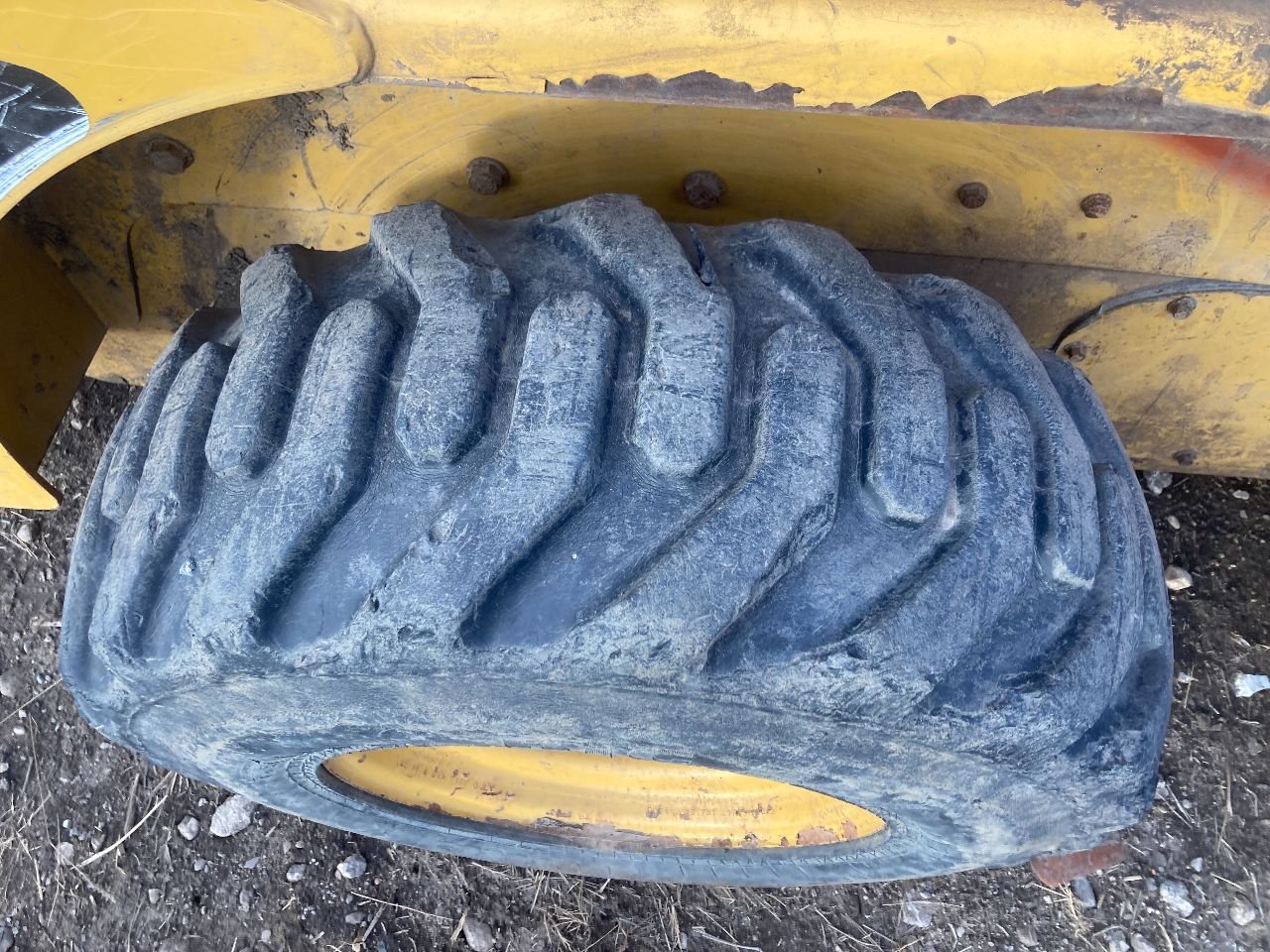 CAT 252B3 Tire and Rim for Sale