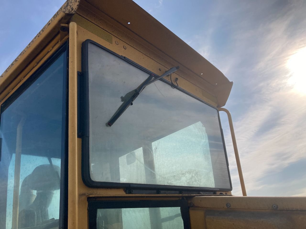 T104481 | John Deere 770CH Windshield Glass for Sale