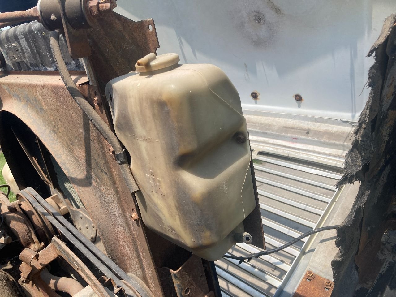 International 1800 LOADSTAR Radiator Overflow Bottle for Sale