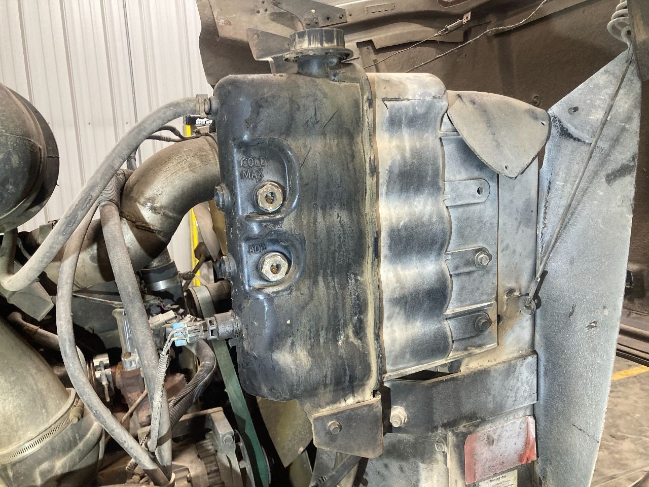 2587279C91 | International 5500I Radiator Overflow Bottle for Sale