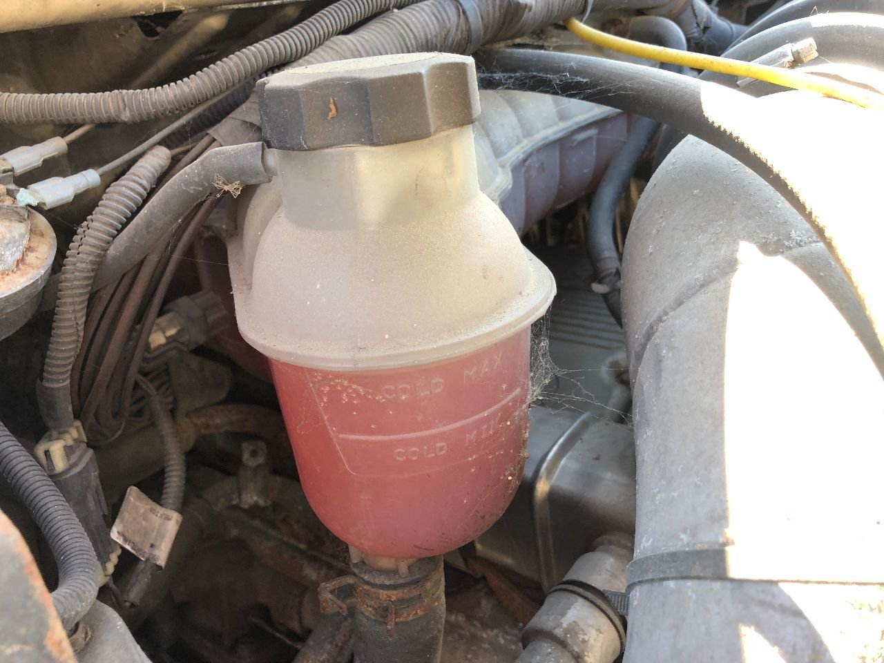 0521414000 | Ford L9511 Radiator Overflow Bottle for Sale