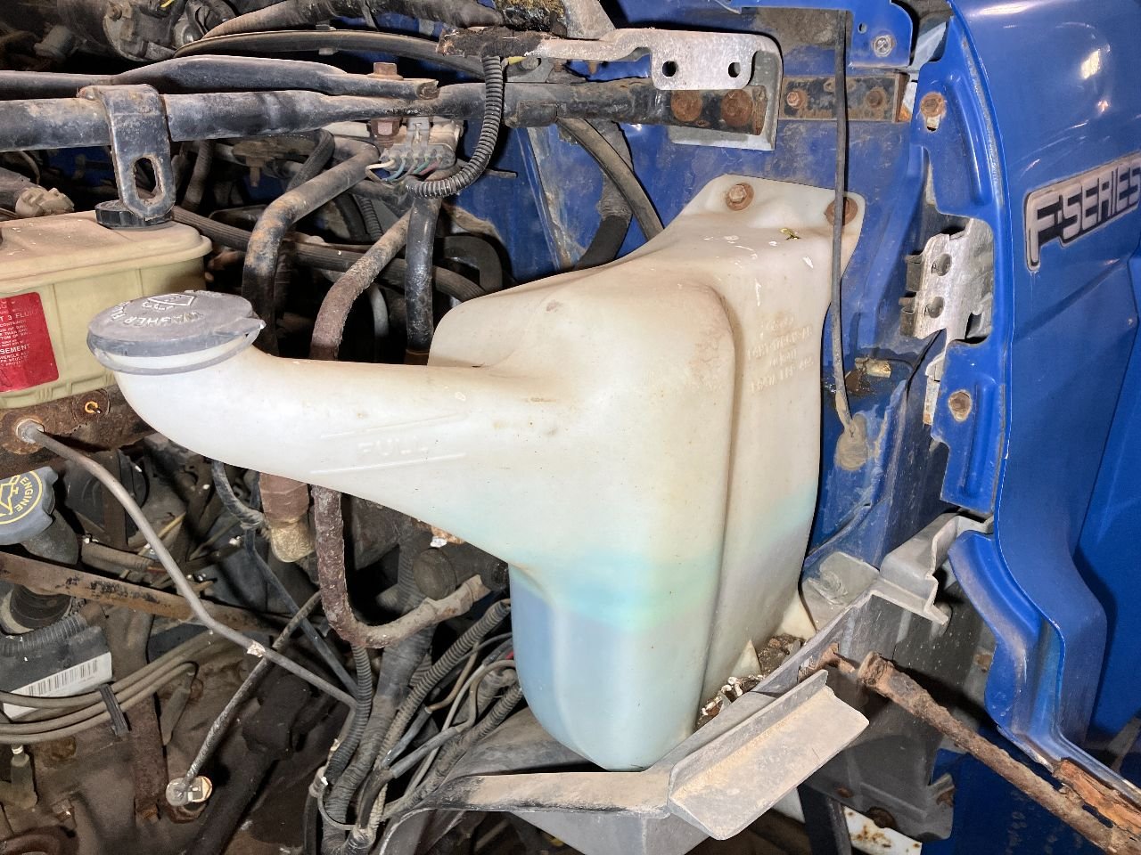 F3HT-17B613-BA | Ford LA9000 Windshield Washer Reservoir for Sale