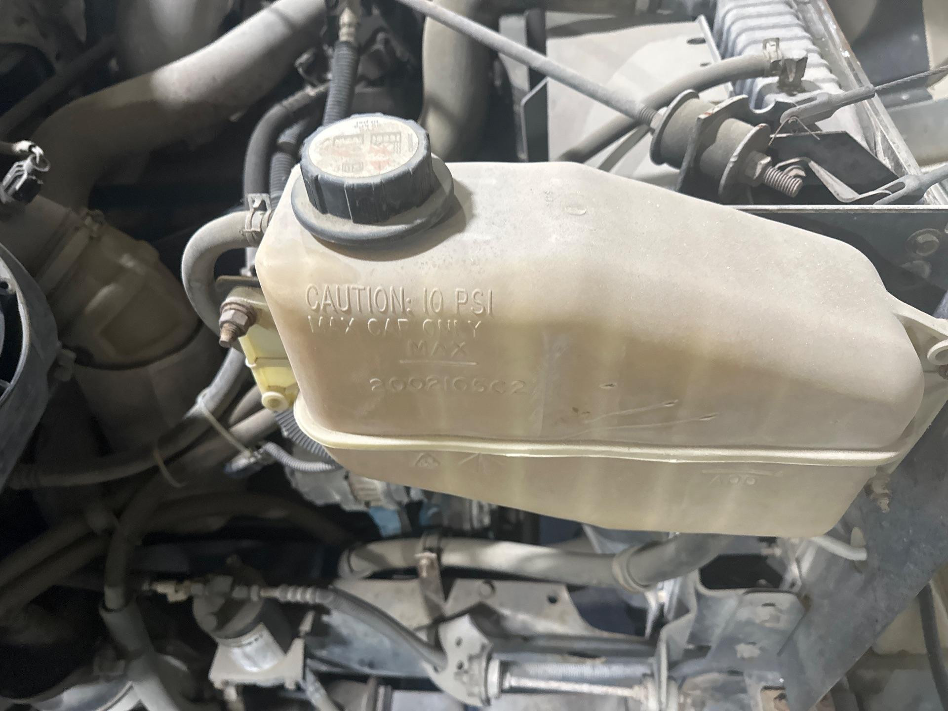 2002105C2 | International 4900 Radiator Overflow Bottle for Sale