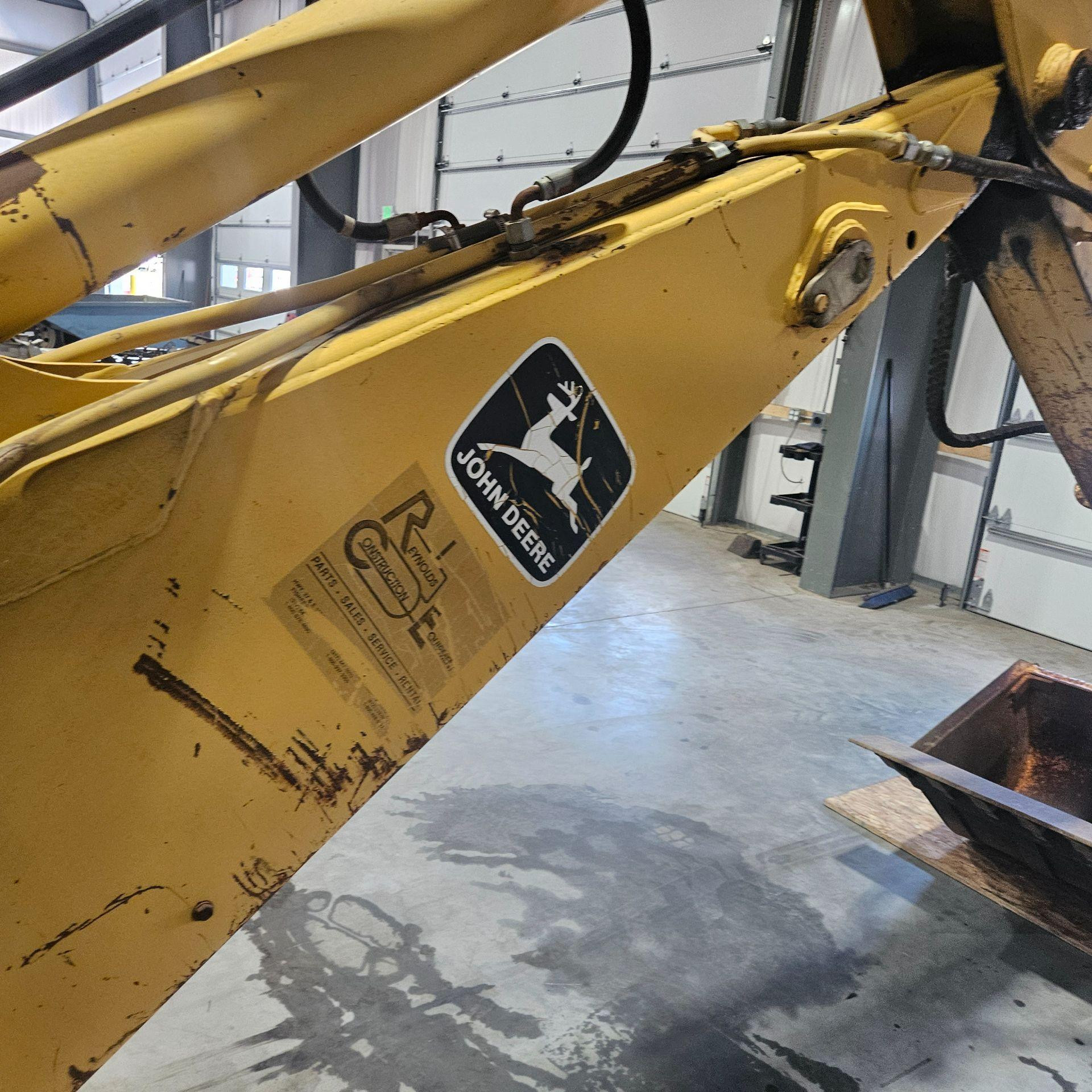 AT174234 | John Deere 510D Boom for Sale