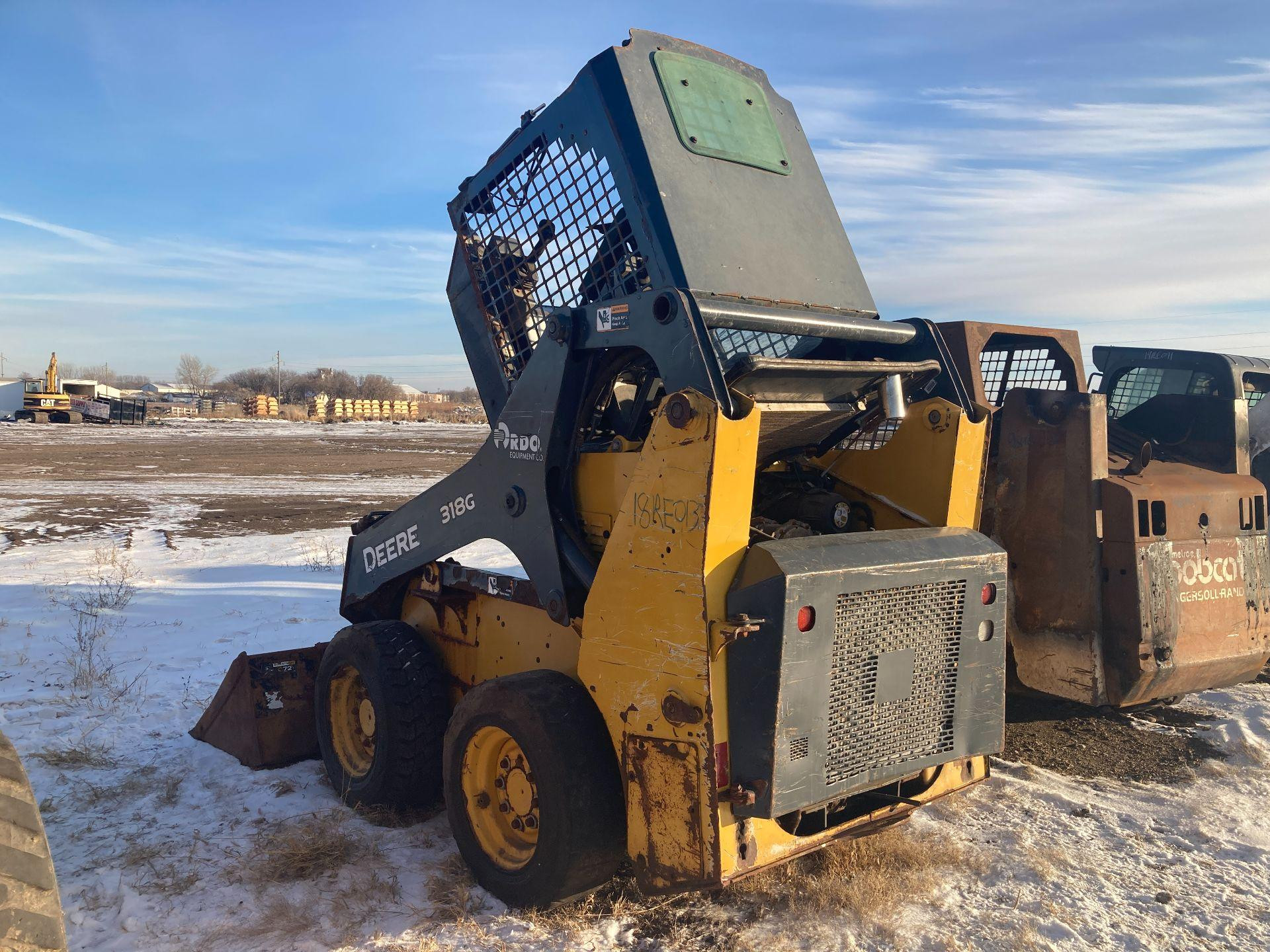 AT484302 | John Deere 318G Cab Assembly for Sale