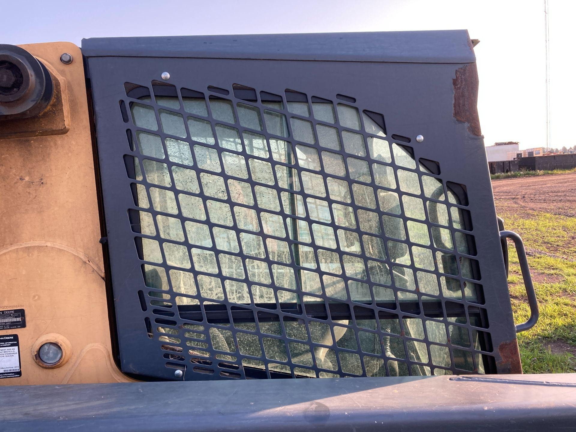 AT555330 | John Deere 333D Cab Assembly for Sale