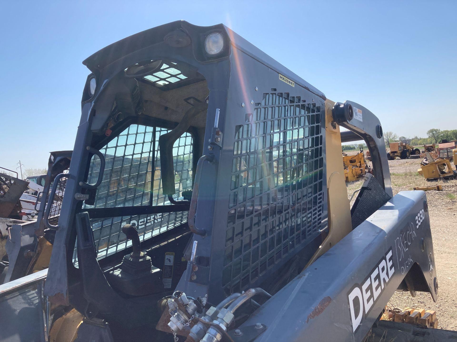 AT555330 | John Deere 333D Cab Assembly for Sale
