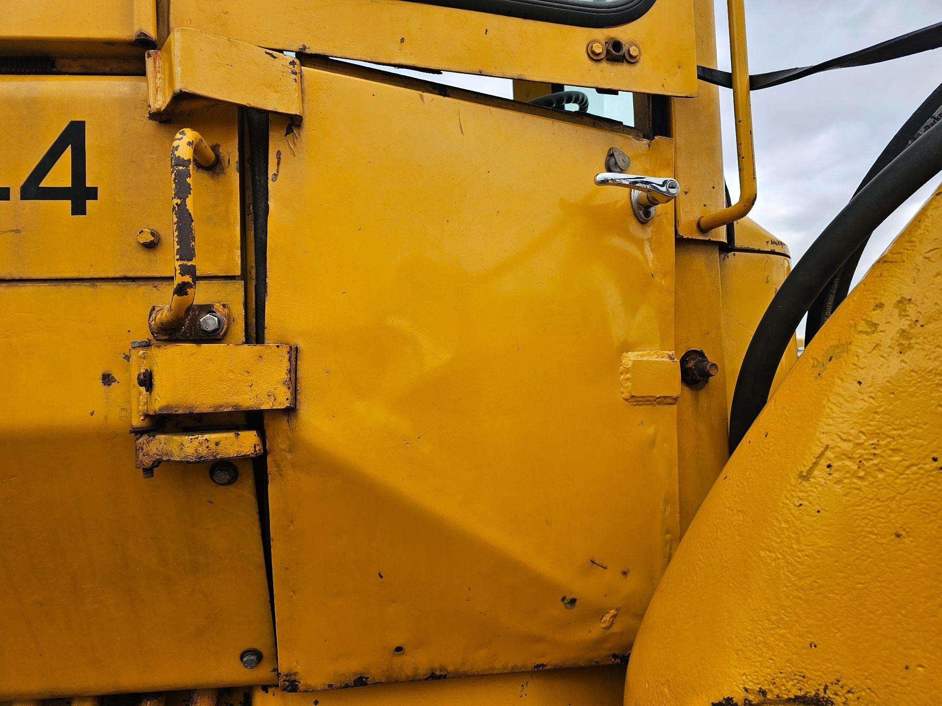 AT54998 | John Deere 644 Door Assembly for Sale