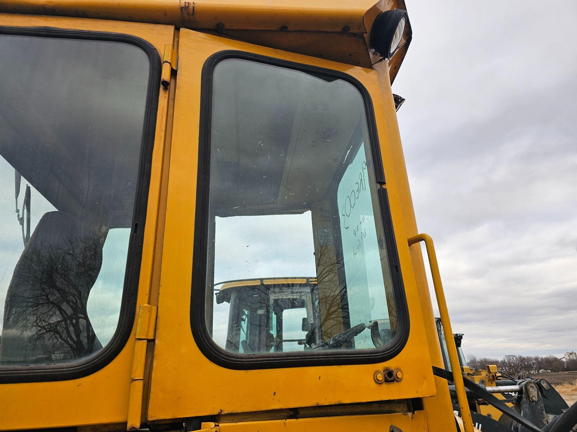 AT29833 | John Deere 644 Door Glass for Sale