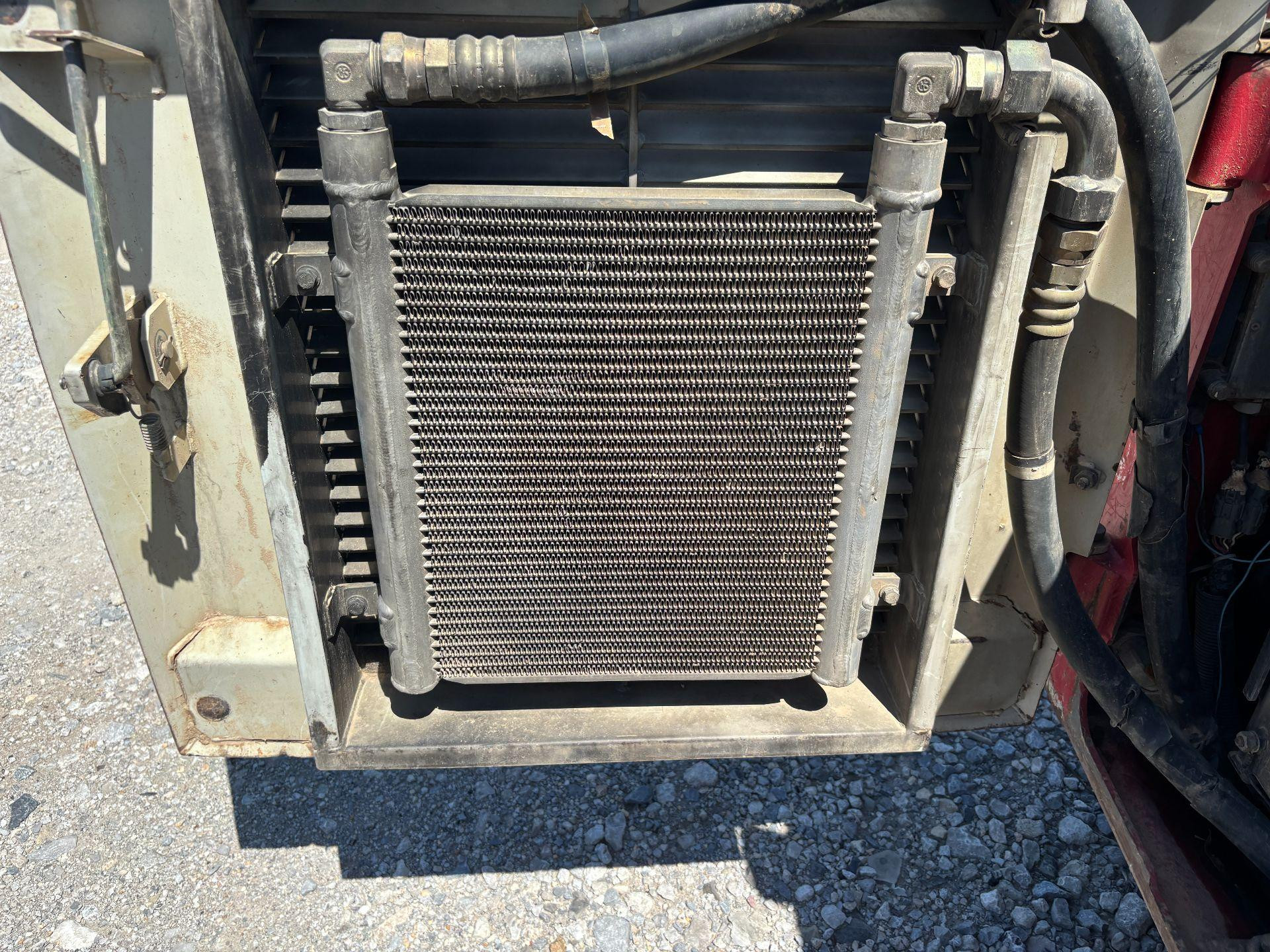 1911300010 | Takeuchi TL140 Hydraulic Cooler for Sale