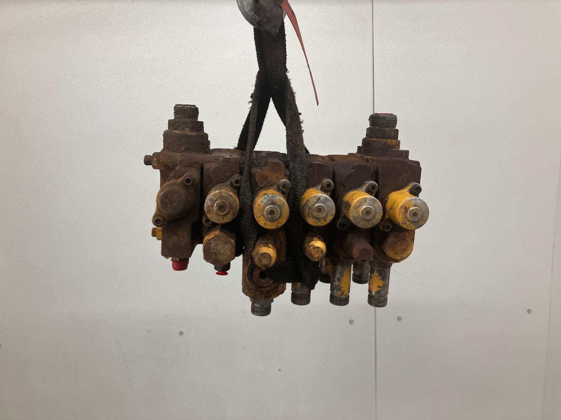 AT176700 | John Deere 310E Hydraulic Valve for Sale