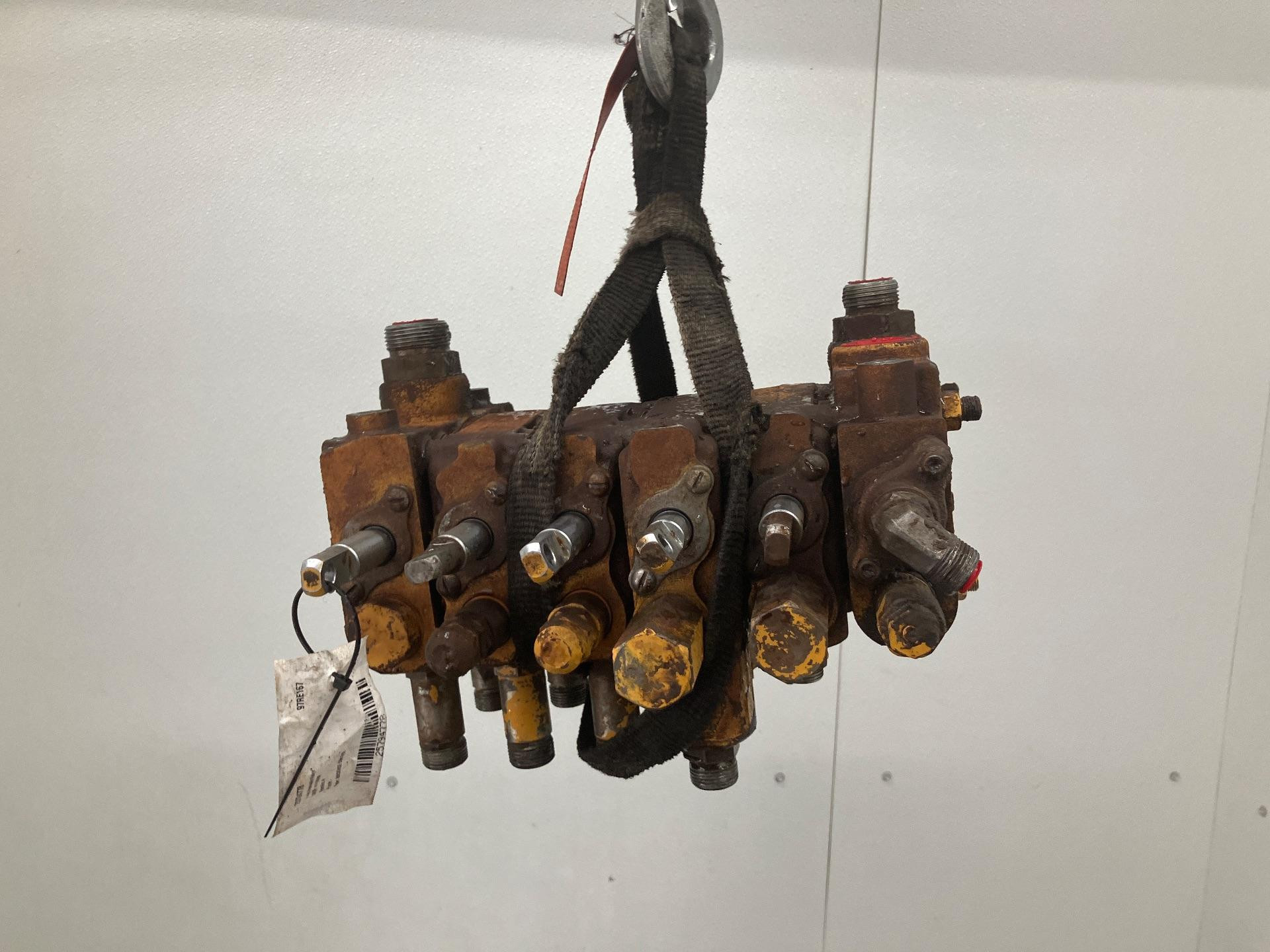 AT176700 | John Deere 310E Hydraulic Valve for Sale