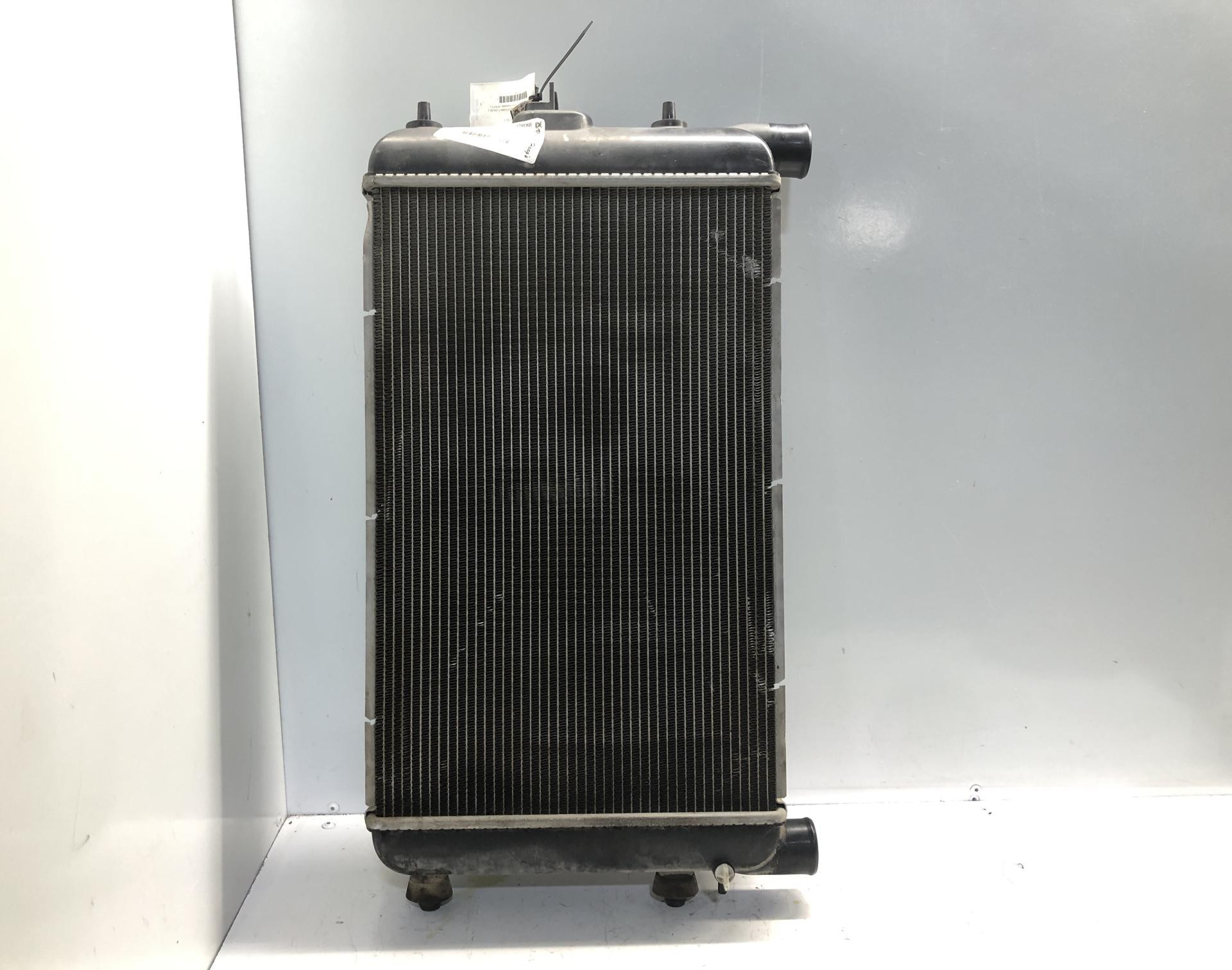 AT425041 | John Deere 324E Radiator for Sale