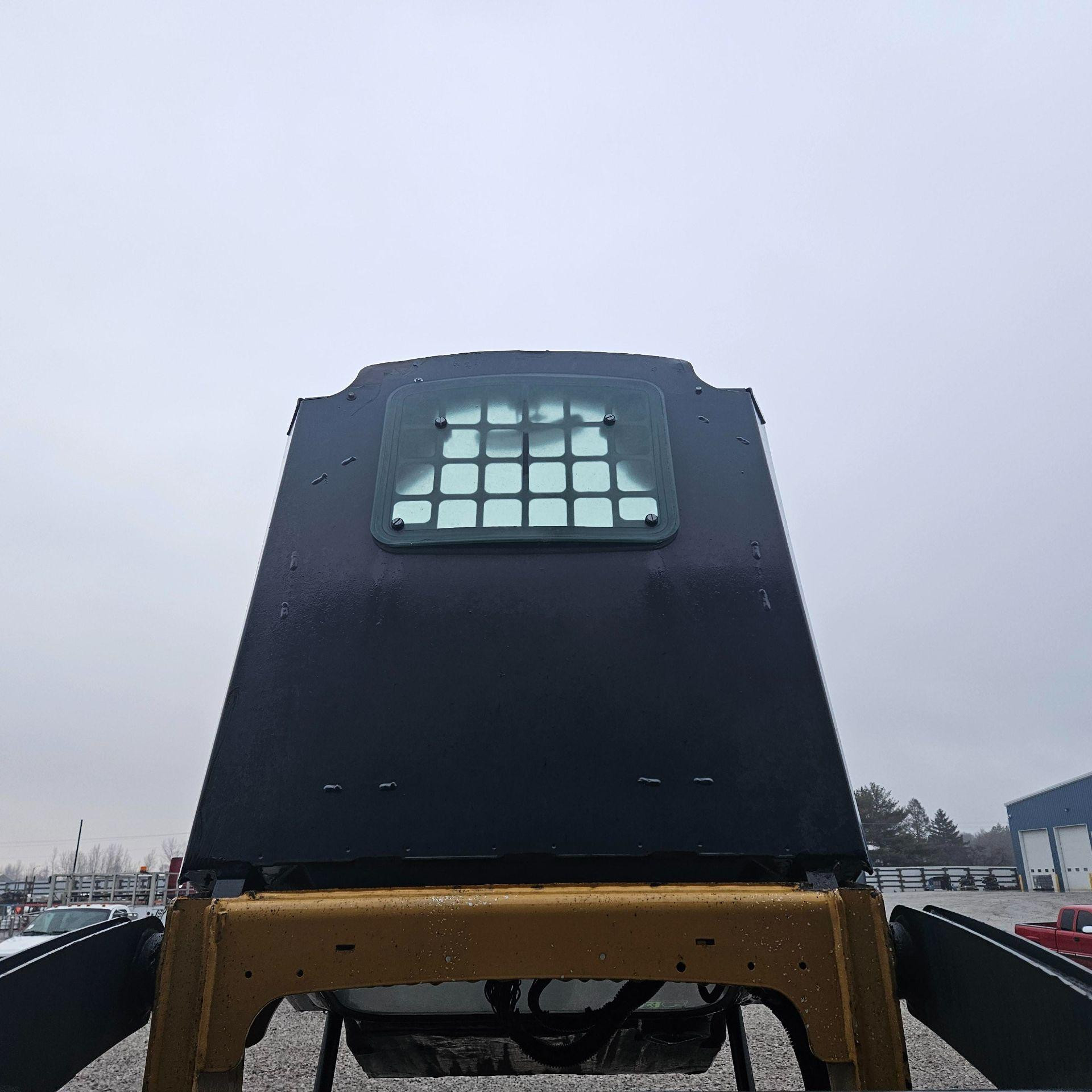 T242807 | John Deere 323D Equip Roof Glass for Sale