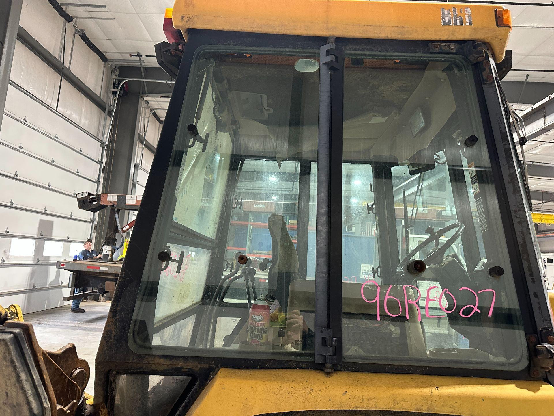 AT151481 | John Deere 310D Equip Side Glass for Sale