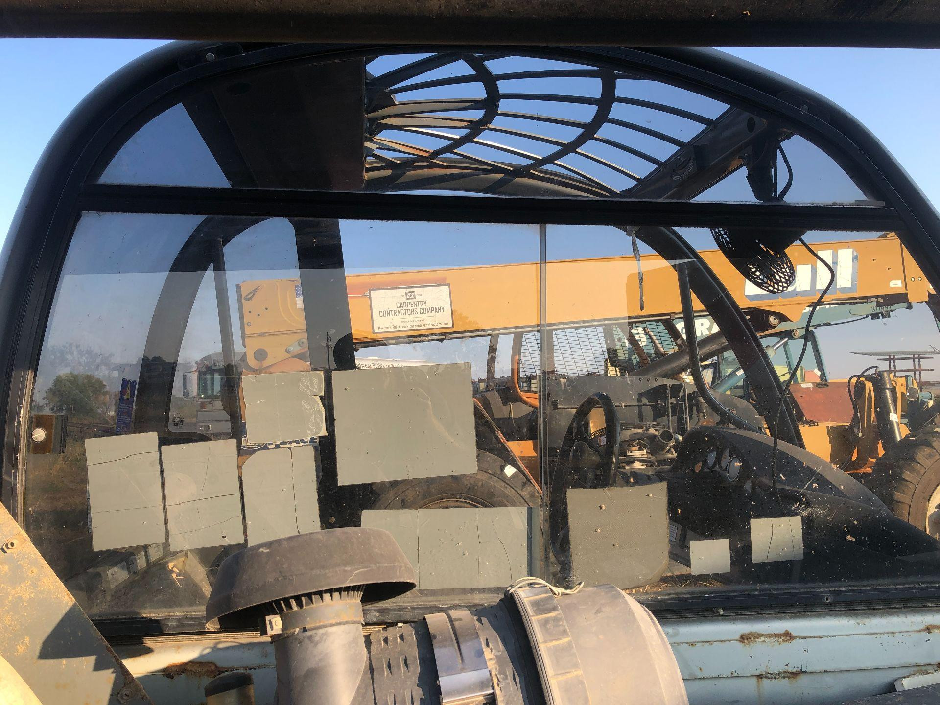 Terex TH842C Equip Side Glass for Sale