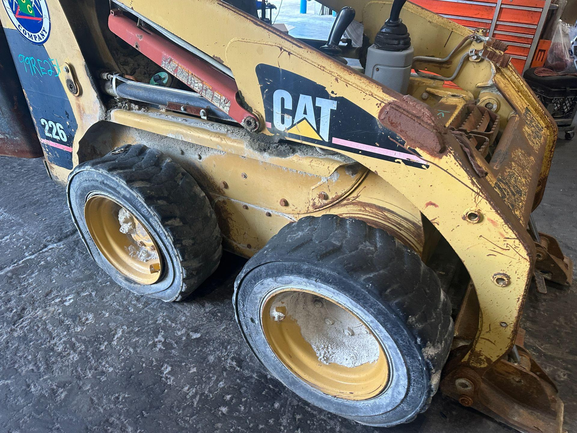 CAT 226 Tire and Rim for Sale