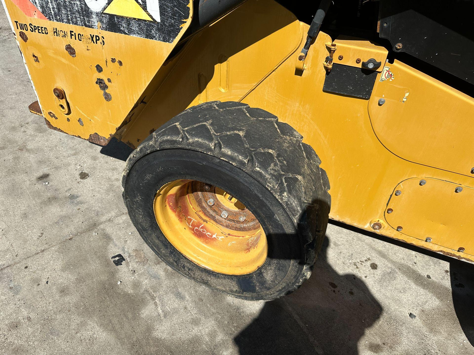 CAT 272D Tire and Rim for Sale
