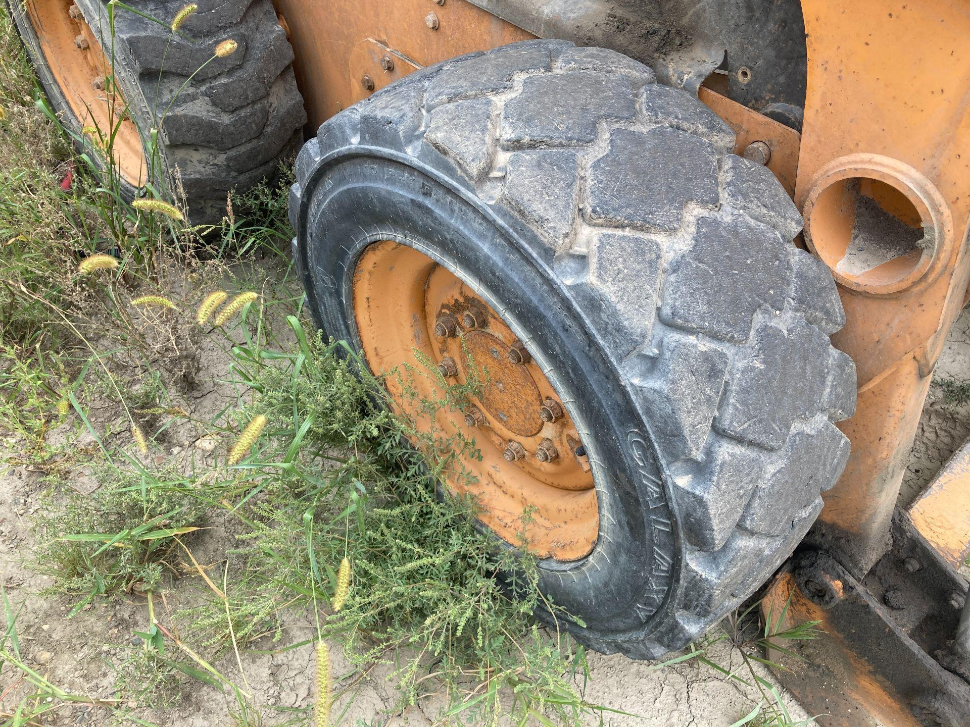 408450A1 | Case 40XT Tire and Rim for Sale