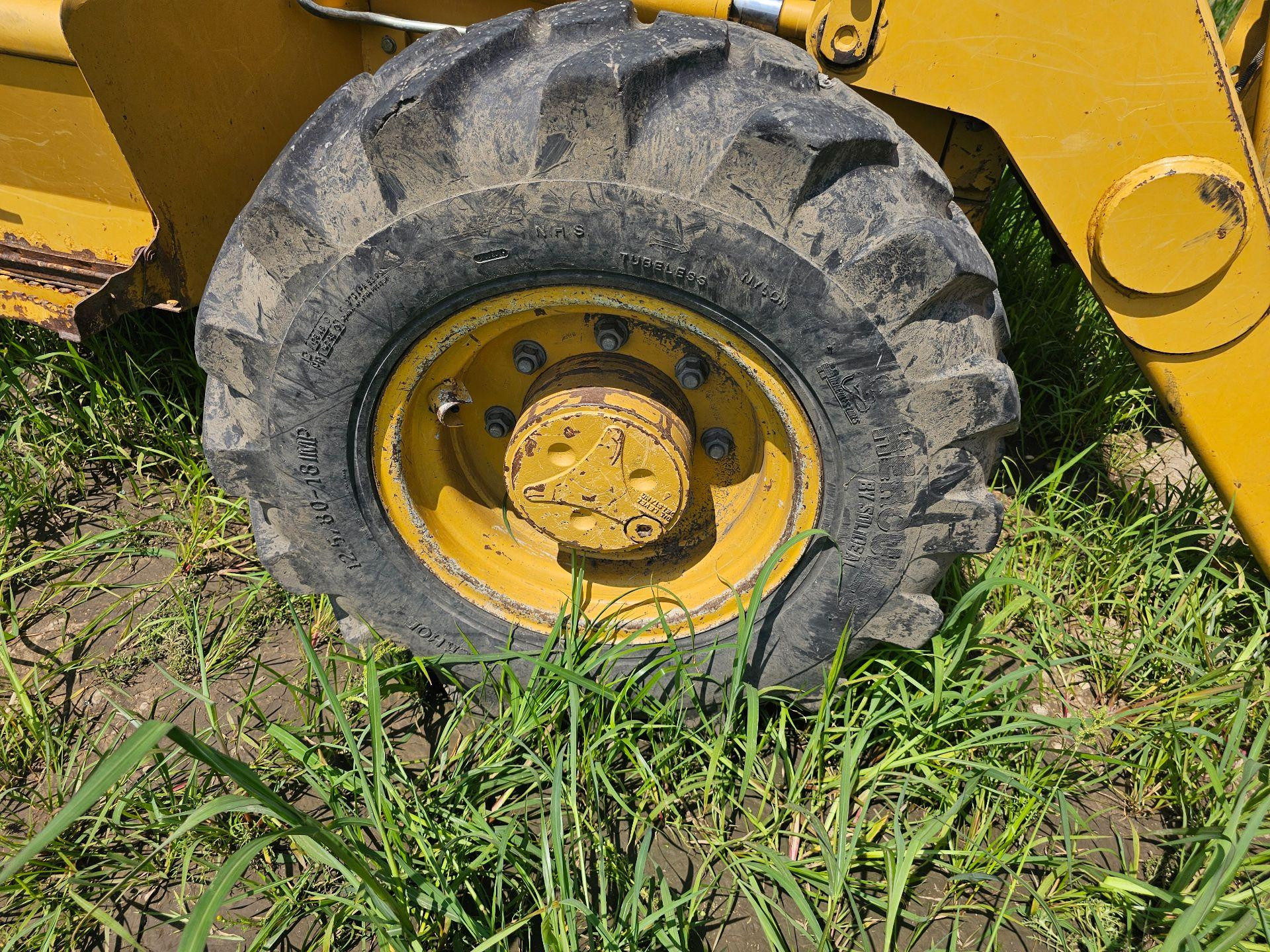 CAT 430D Tire and Rim for Sale