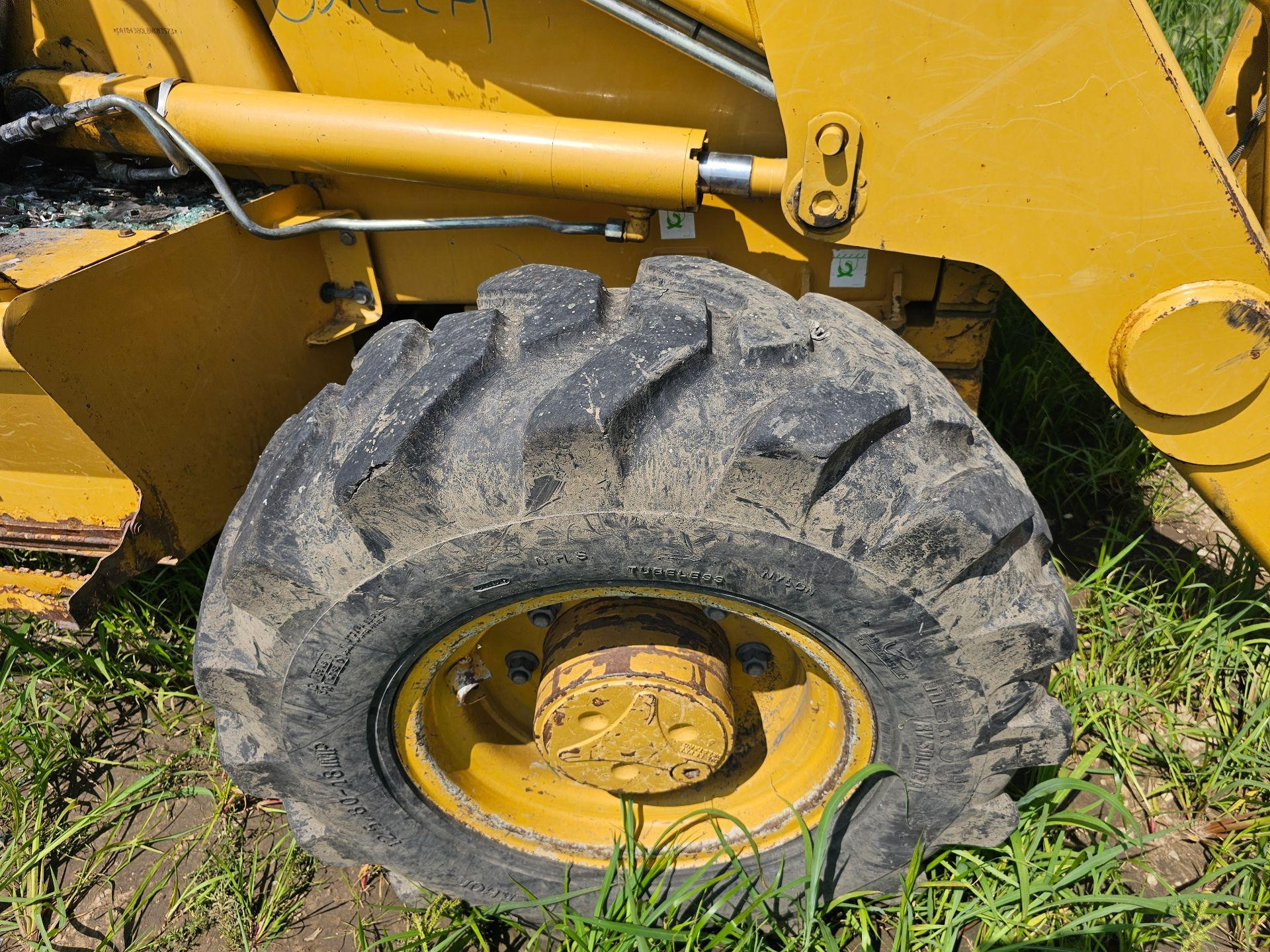 CAT 430D Tire and Rim for Sale