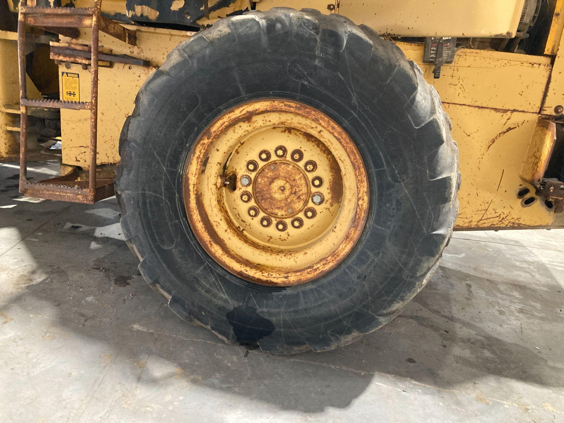 John Deere 544E Tire and Rim for Sale