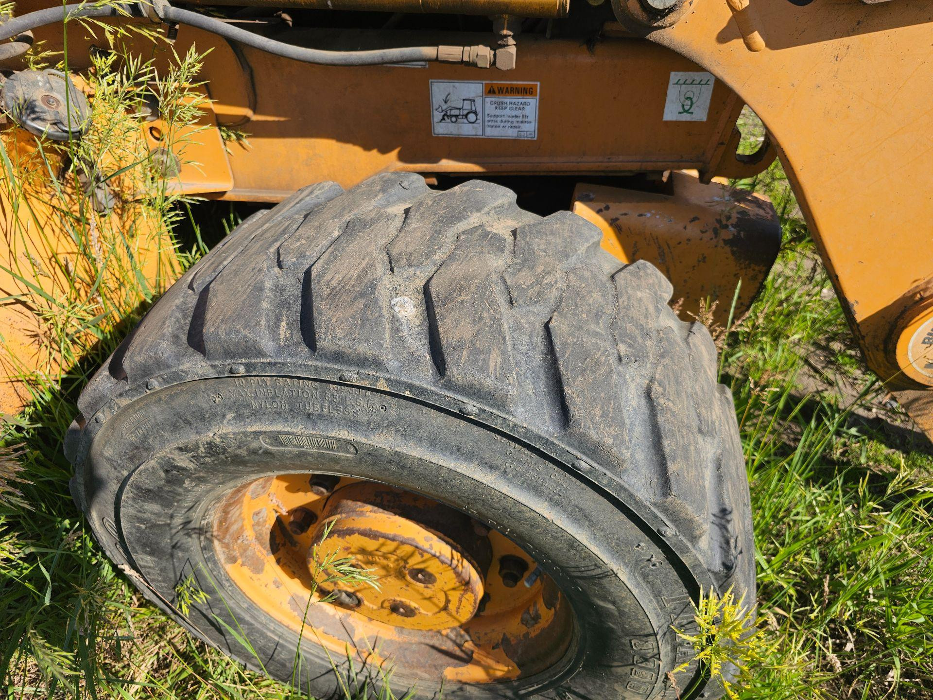 427084A1 | Case 580M Tire and Rim for Sale