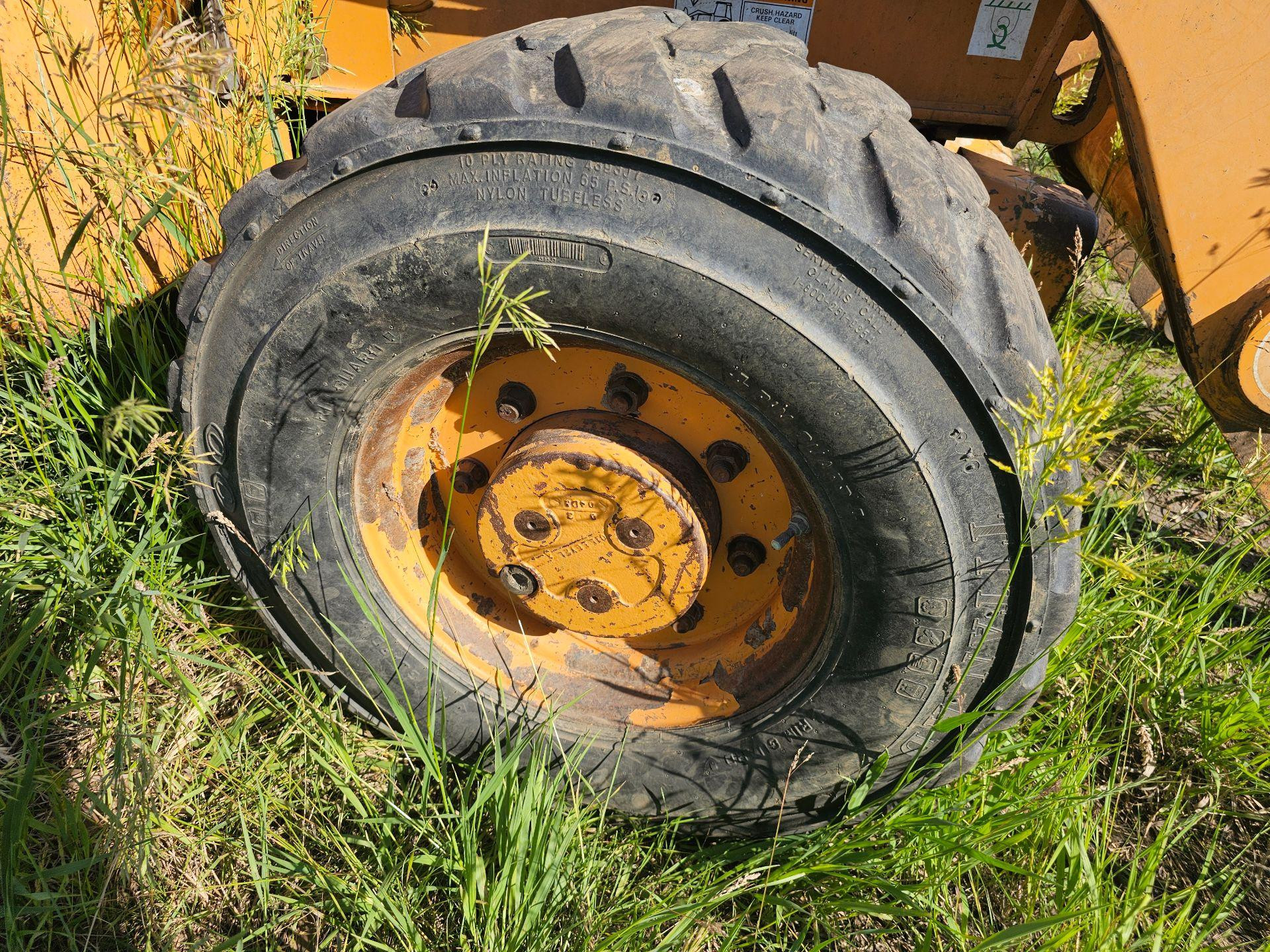 427084A1 | Case 580M Tire and Rim for Sale