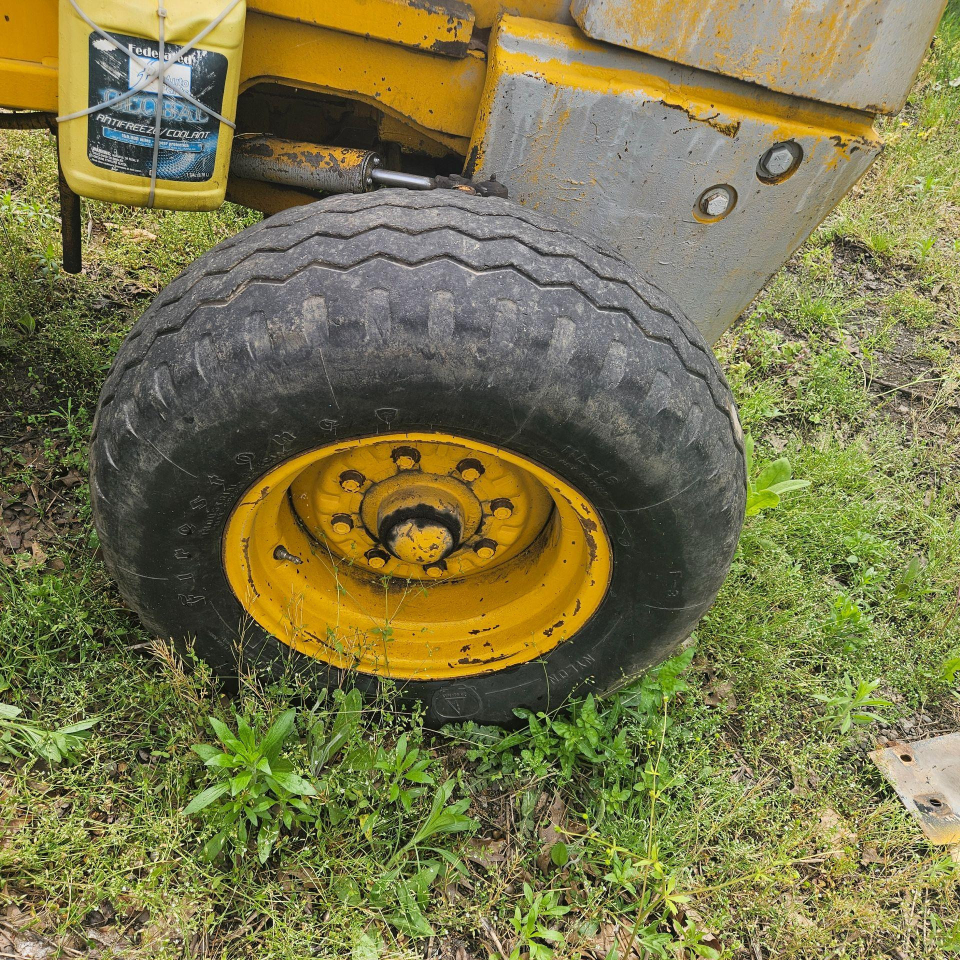 Case 584 Tire and Rim for Sale