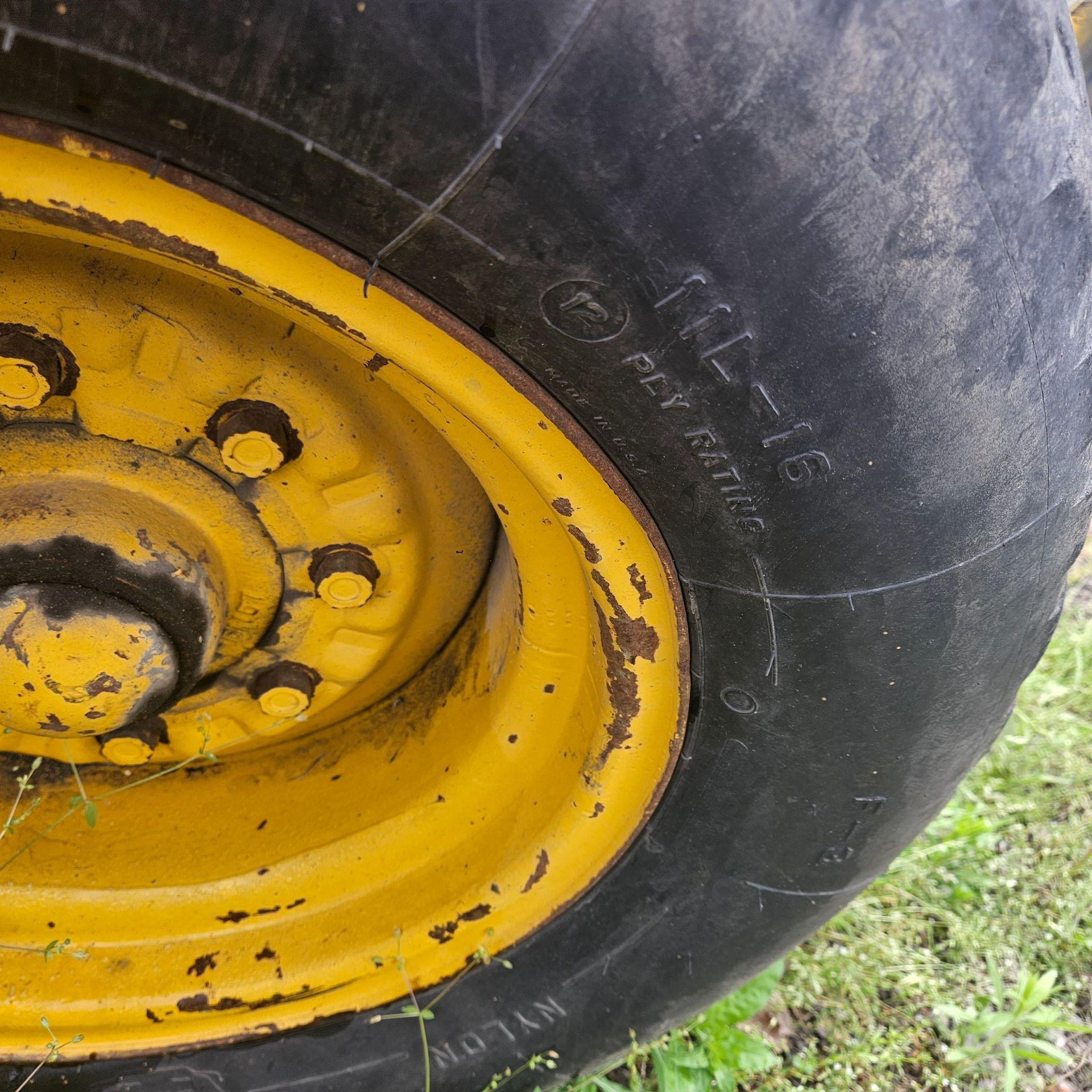 Case 584 Tire and Rim for Sale