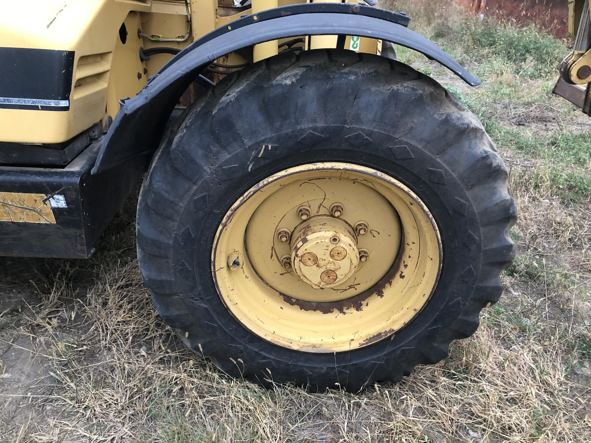 8I-3110 | CAT TH63 Tire and Rim for Sale
